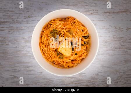 Red seasoned noodles with background Stock Photo - Alamy