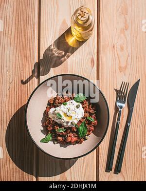 Tasty Eggplant saute with tomato and herbs Stock Photo - Alamy
