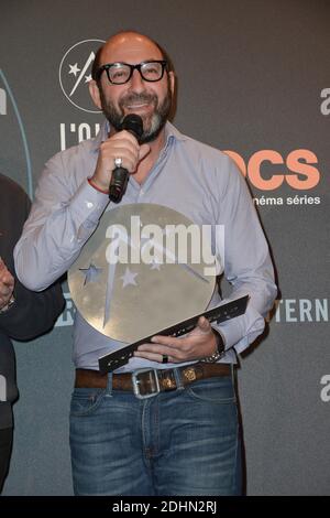 Kad Merad posing with Isere Special Award while attending the closing ...
