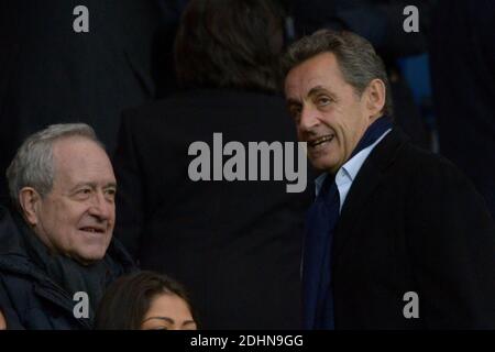Jean Tiberi and Nicolas Sarkozy in the stands attending the French ...