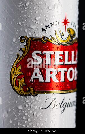 Condensation water droplets on Stella Artois beer can isolated on black ...