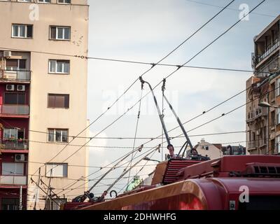 trolley pole connecting to electrical line Stock Photo - Alamy