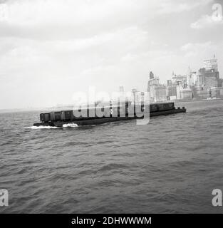 A barge with freight containers in New York harbor Stock Photo - Alamy