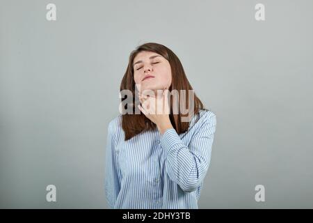 Domestic violence. Female hands choke a frightened man with a pillow ...