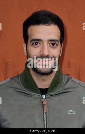 Tarek Boudali posing at the Village during French Tennis Open at Roland ...