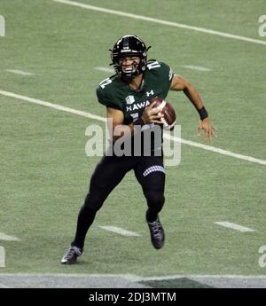 Hawaii quarterback Chevan Cordeiro (12) during an NCAA football game ...