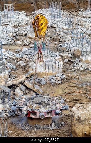 a pile of bricks at the foundation of a demolished building Stock Photo ...