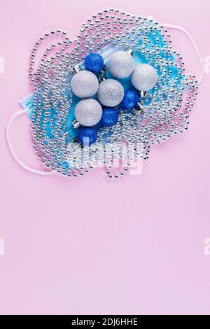 Gray Christmas decorations on pink Stock Photo - Alamy