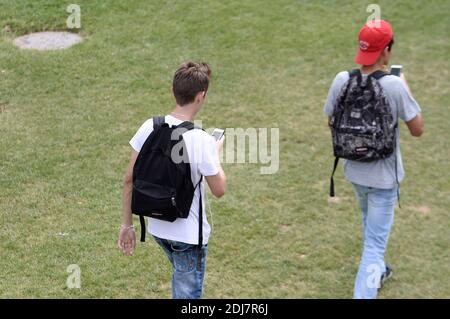 Pokemon Go hunters at Parc de La Villette in Paris, France on August 11 ...