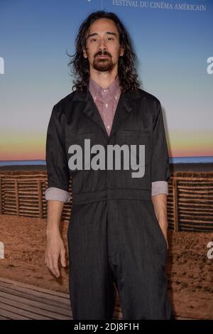 Director Jason Lew attending a photocall for The Free World at the 42nd ...