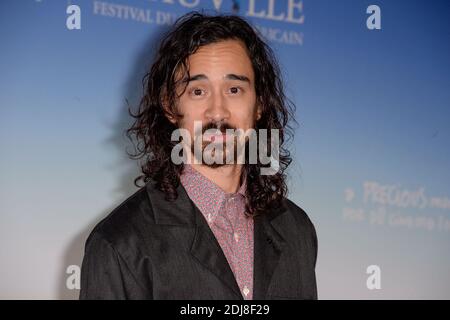 Director Jason Lew attending a photocall for The Free World at the 42nd ...