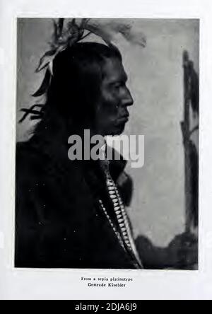 Native American man of the Sioux Nation dressed in traditional regalia ...