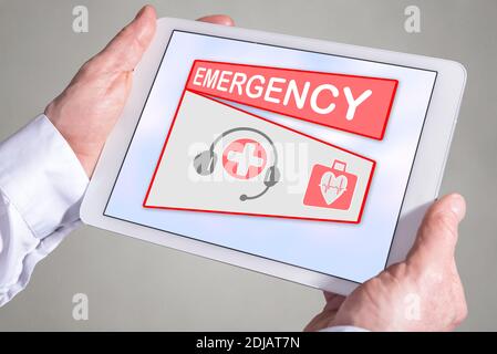 Tablet screen displaying an emergency concept Stock Photo - Alamy