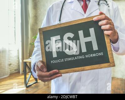 Follicle-stimulating hormone (FSH). Test tube with artificial hormone ...