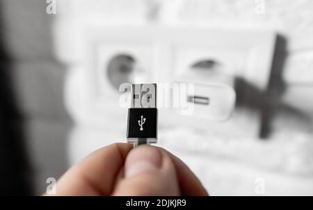 insert USB type c plug into USB port on laptop computer Stock Photo - Alamy