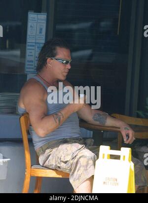 Exclusive!! Mickey Rourke braves the daylight to have a smoke and a ...