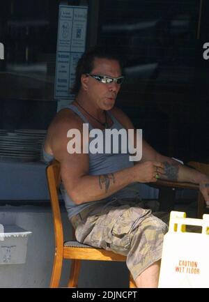 Exclusive!! Mickey Rourke braves the daylight to have a smoke and a ...