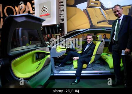 Emmanuel Macron visits the Paris Motor show on October 14, 2016 at ...