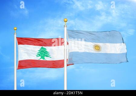 Lebanon and Argentina flag waving in the wind against white cloudy blue ...