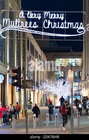 Night view of Multrees Walk upmarket shopping street with Christmas ...