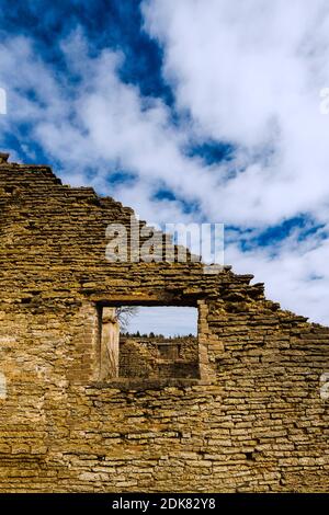 Rooftop and brick wall of house against ocean and sky in San Diego ...