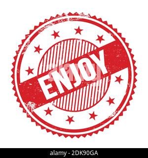 ENJOY, word written on red round stamp sign Stock Photo - Alamy
