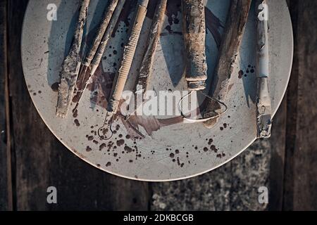 Tools for forming clay on wooden background Stock Photo - Alamy