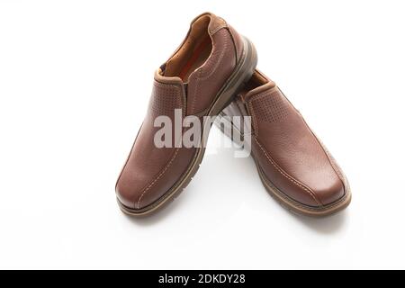 Brown shoes isolated on white background Stock Photo - Alamy