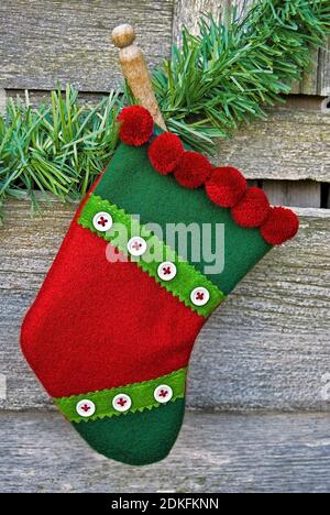 Christmas sock with decor on wooden background Stock Photo - Alamy