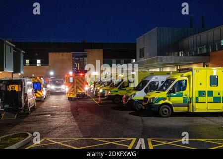Ambulances at the entrance to the emergency department with a number of ...