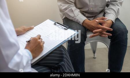 Doctor or psychiatrist consulting and diagnostic examining stressful ...