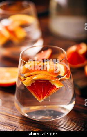 Detox water with blood oranges in drinking glass Stock Photo - Alamy