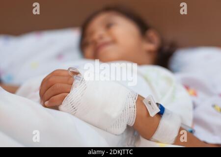 intravenous injection to the child. Hand of a child with a needle ...