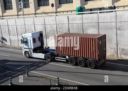 truck with Triton container on motorway. Triton International Limited ...