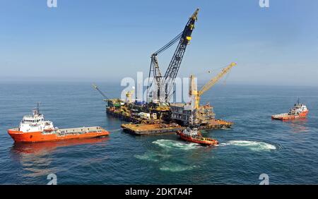 Australia. Industry. Bass Strait. Offshore oil platform at sunrise ...