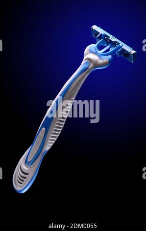 Dark blue safety razor on a white background Stock Photo - Alamy