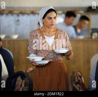 Waitress in national dress, Turkish restaurant, Istanbul, Republic of ...