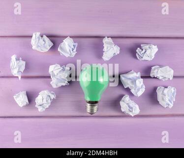 Ideological concept with wastepaper light bulb on wooden table Stock ...
