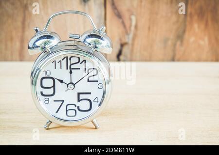 Clock show 10 am or pm on wood background with copy space. clipping ...
