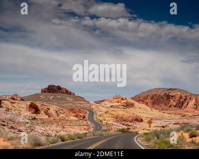 Asphalt road through the sandstone formations in the Valley of Fire ...