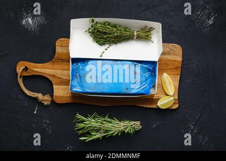 Frozen skinless rasp fillet in vacuum packaging Stock Photo - Alamy