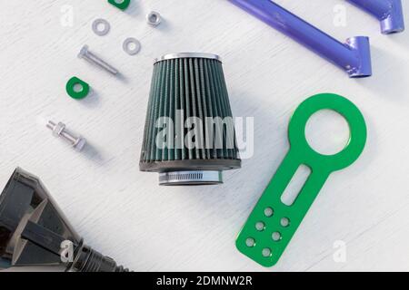 flat lay car spare parts details isolated on the table, minimalist ...