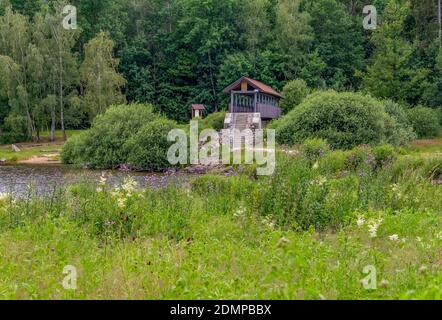 idyllic waterside scenery including a roofed bridge around Wiesenfelden ...