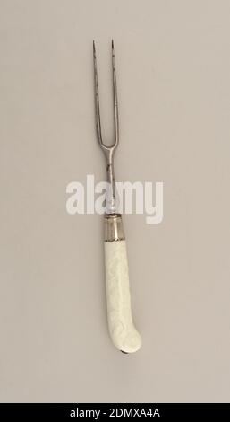 Fork. Long two-tined fork, decorated at the inside of the rounded ...