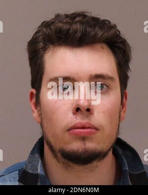 In a booking photo provided by the Michigan State Police, paramedic ...
