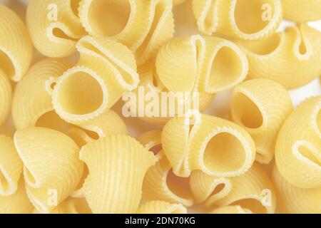 Italian Pipe Rigate Macaroni Pasta raw food background or texture close ...