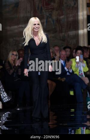 Designer Donatella Versace walks on the runway during the Versace Pre ...