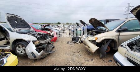 Car wrecks in a typical American junkyard, Houston, Texas Stock Photo ...