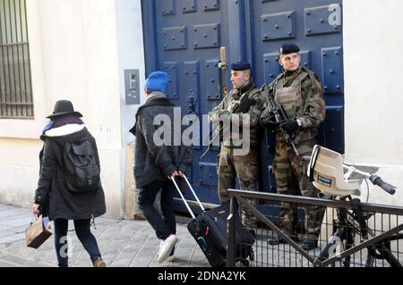 French Army soldiers stand guard outside jewish school Yad Mordekhai ...