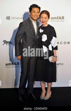 Singer and actor Alex To (L) and his wife Ice Lee (R) arrive on the red ...